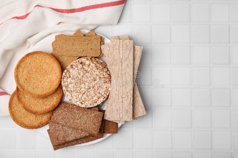 Rye Crispbreads, Rice Cakes and Rusks on White Checkered Table, Flat ...