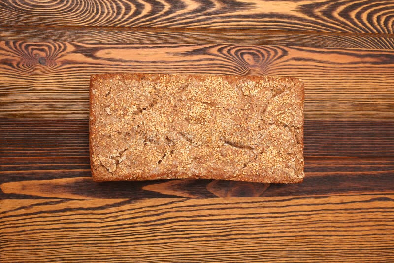 Rye Home-made Bread with Sesame on the Wooden Table Stock Photo - Image ...