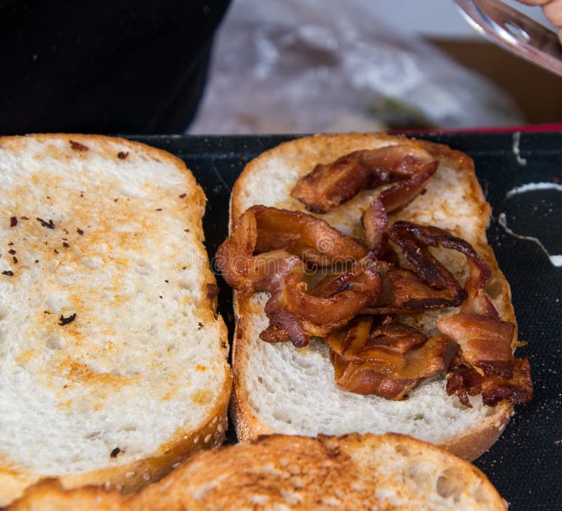 Rye Toast with Bacon on Griddle Stock Photo - Image of brunch, grill ...