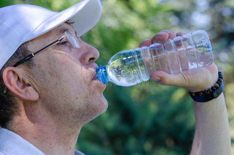 The 50s Age Man is Drinking Water Stock Image - Image of drinking ...