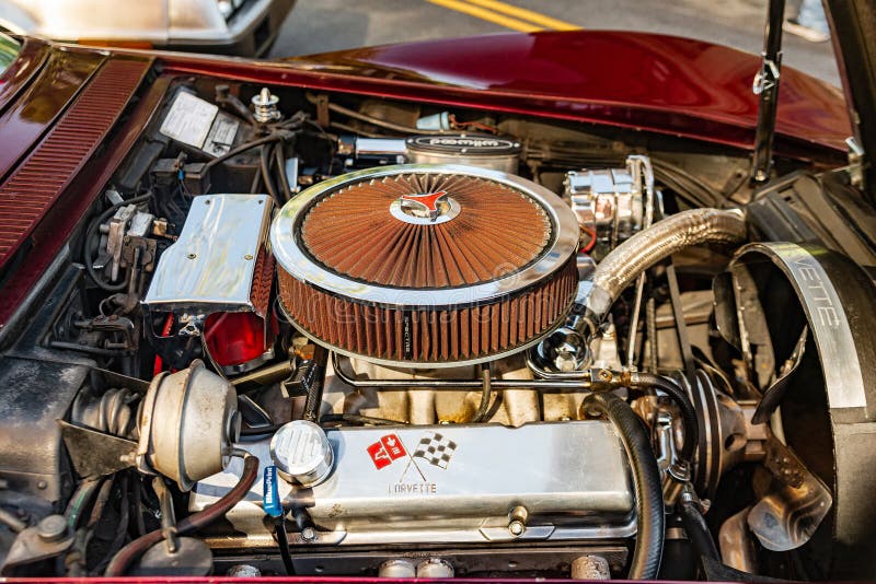 1970s Chevrolet Corvette Car with Open Hood . Close-up of the Engine ...