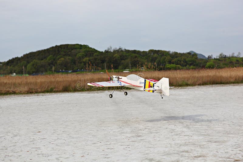 A model plane at the park editorial photo. Image of flies - 233905701