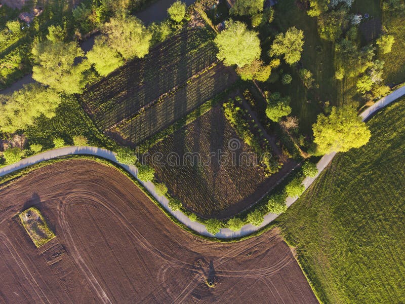 S-shape path in small city stock photo. Image of vegetation - 219716564