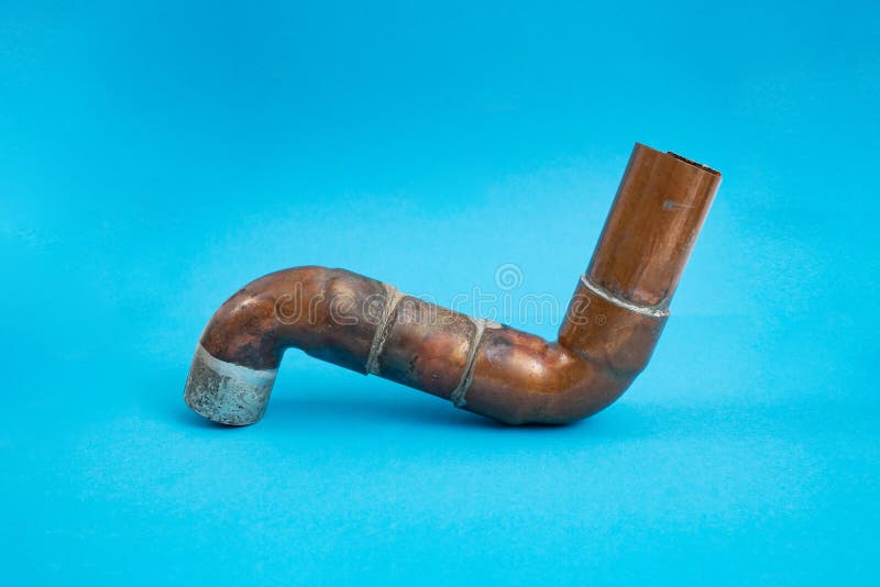 S Shaped Copper Pipe Used for Heating System, on Blue Background Stock ...