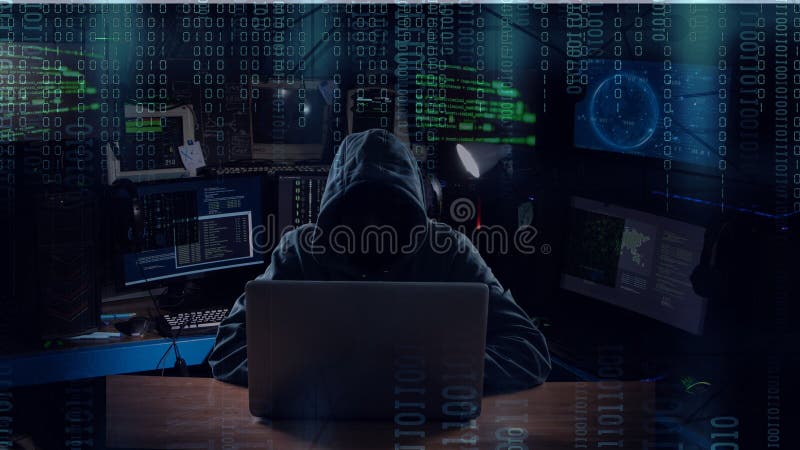 A Computer Hacker Wearing a Hoodie and Face Mask, Surrounded by Data ...