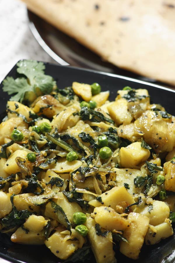 Saag Aloo Bhuna - Potato and Spinach Dish Stock Photo - Image of aloo ...