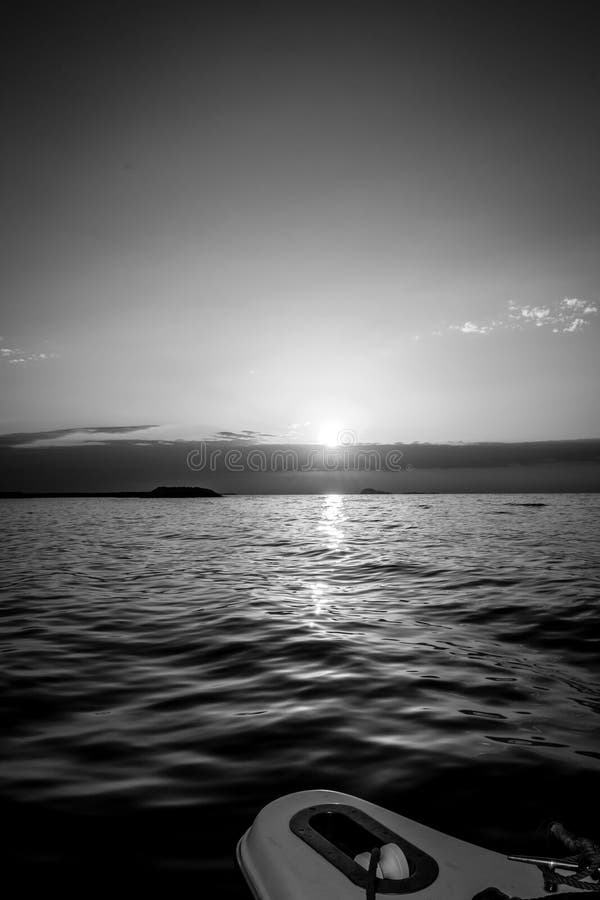 Saaidia Sunset Beach and Waves and Rocks Stock Photo - Image of chair ...