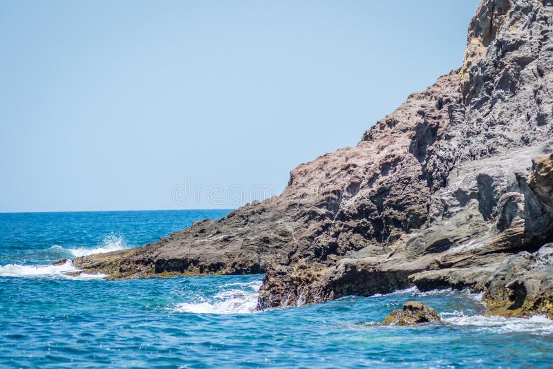 Saaidia Island and Waves and Rocks Stock Photo - Image of locations ...