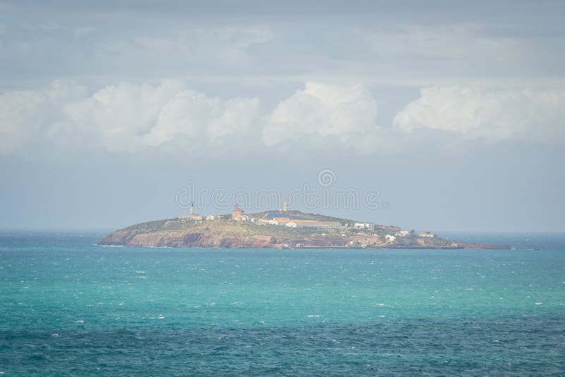 Saaidia island and waves stock photo. Image of mediteranian - 124384742