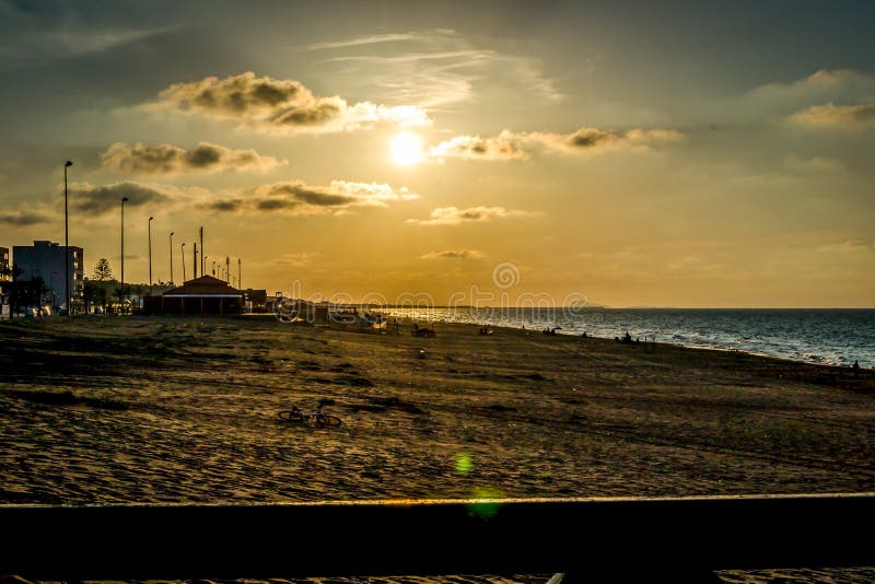 Saaidia Sunset Beach and Waves and Rocks Stock Image - Image of harbor ...