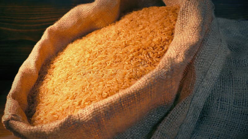 Sack of Rice Moving Shot stock video. Video of staple - 393523083