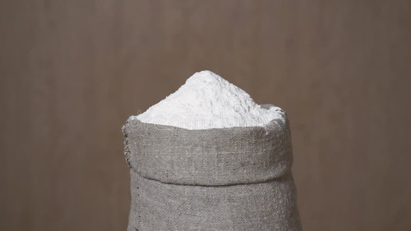 Sack of Wheat Flour on a Brown Background Stock Video - Video of pastry ...