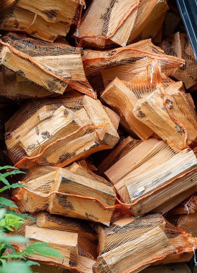 Sacks of Fire Wood in a Shed.. Stock Photo - Image of heat, fireplace ...