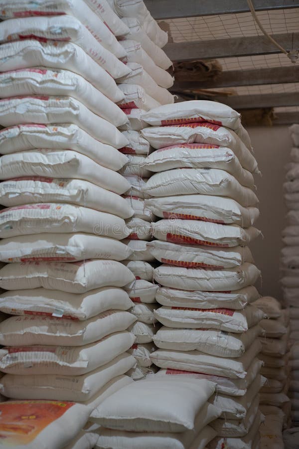 Sacks of flour piled up stock image. Image of baking - 268136749