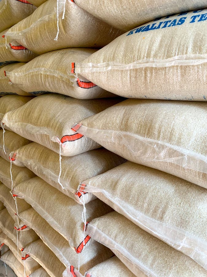 Sacks of rice grains stock image. Image of ready, rice - 253036203