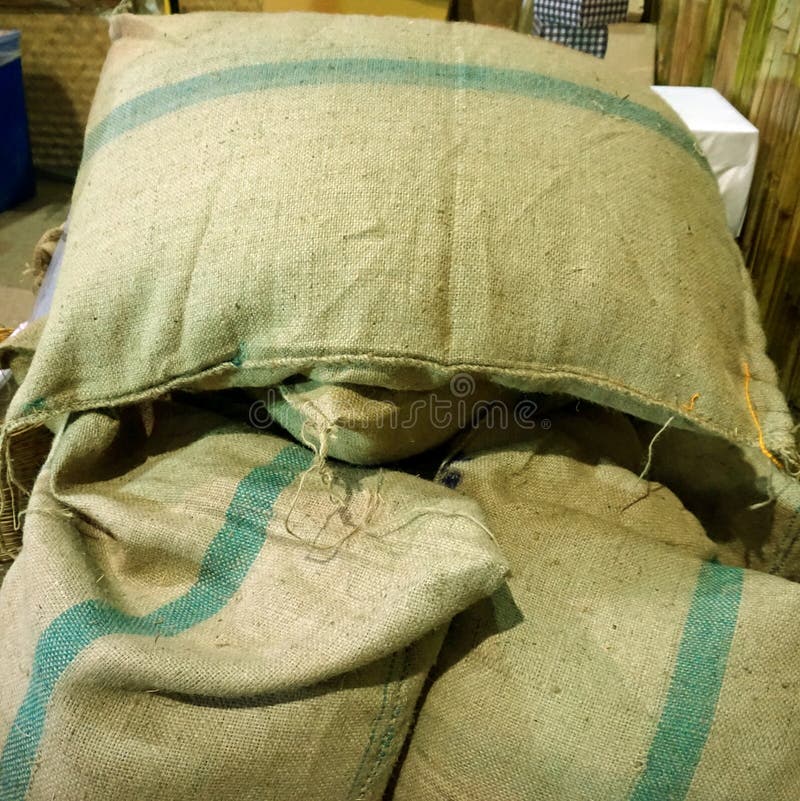 Sacks of rice stock image. Image of wallpaper, brown - 54523119