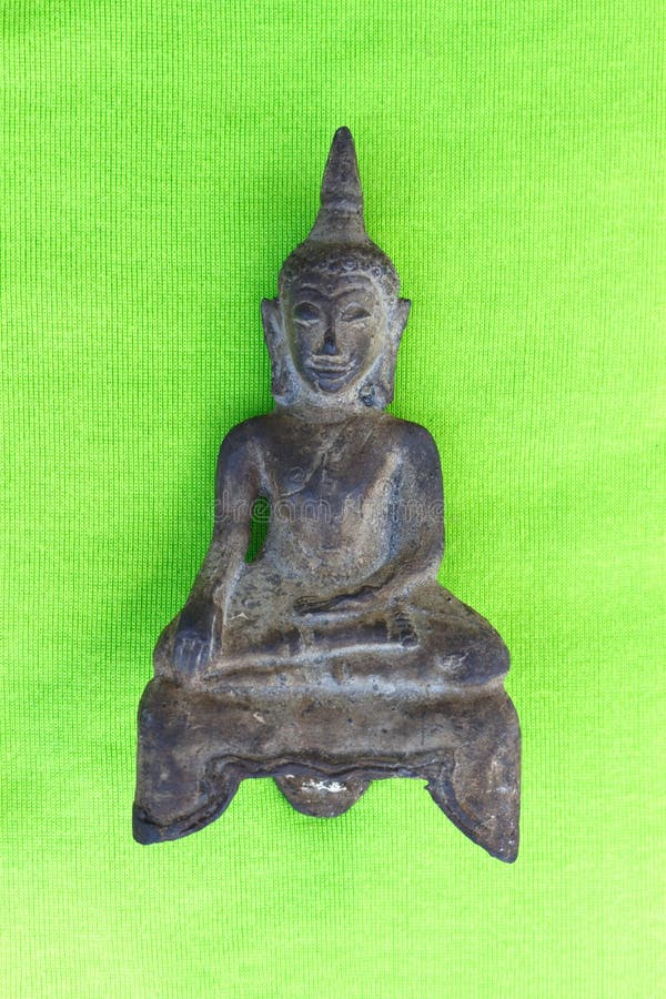 Sacred Buddhist Clay Objects on Green Cloth Stock Photo - Image of ...