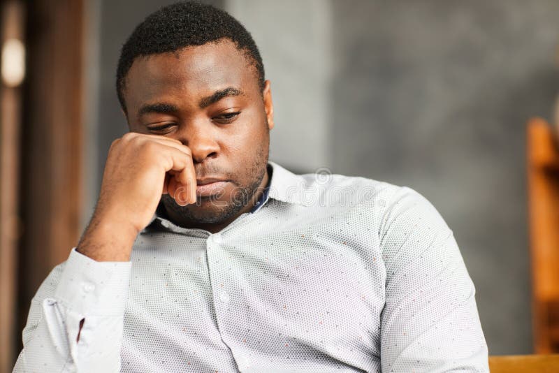 Sad African man stock image. Image of confidence, sadness - 182800091