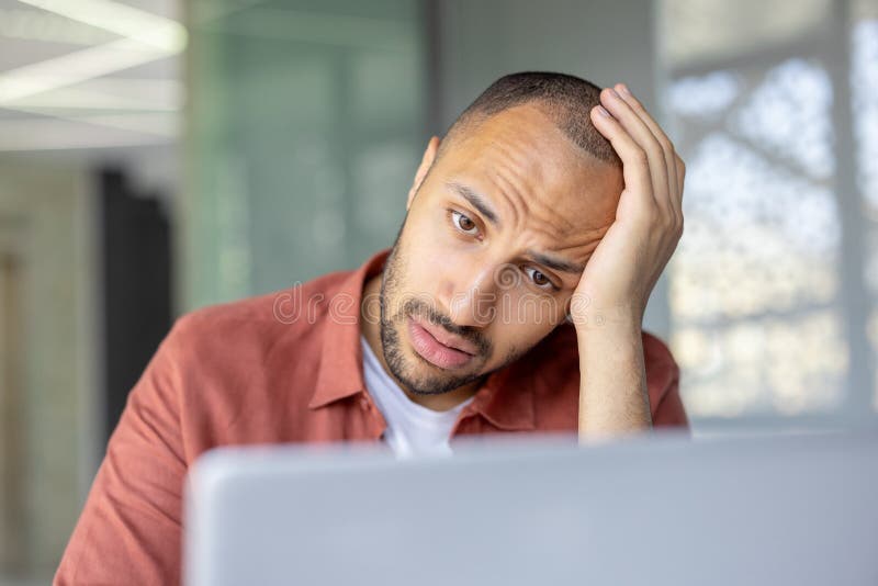 Sad Anxious Man Working with Laptop Inside Office. Close-up of Office ...