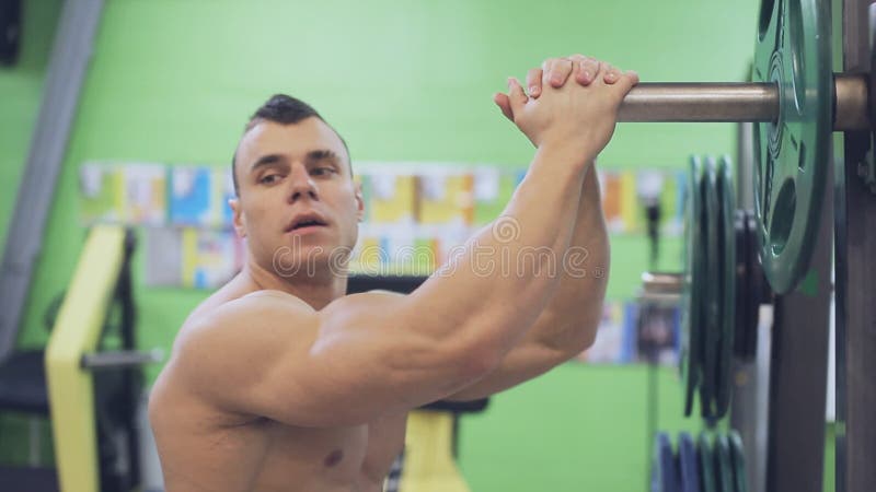 Muscular Bodybuilder Makes Exercise for Biceps in the Gym Stock Video ...