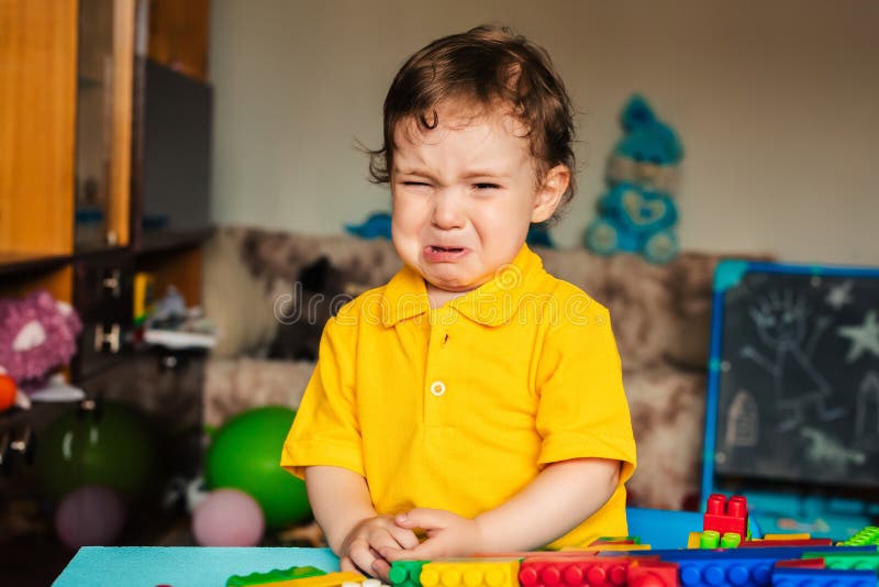 Sad Baby Boy Crying Next To Toys Stock Image - Image of crying ...