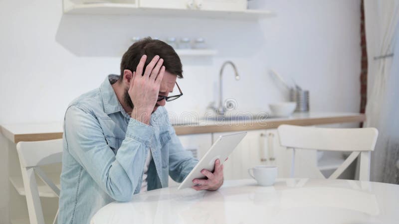 Sad Beard Young Man Facing Loss on Tablet Stock Image - Image of white ...