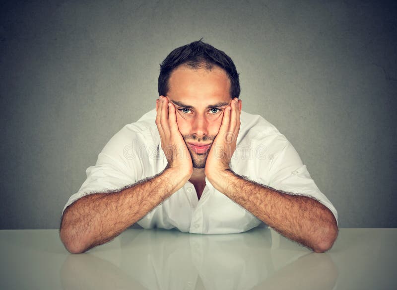 Sad Bored Man Sitting at Table in His Office Stock Image - Image of ...