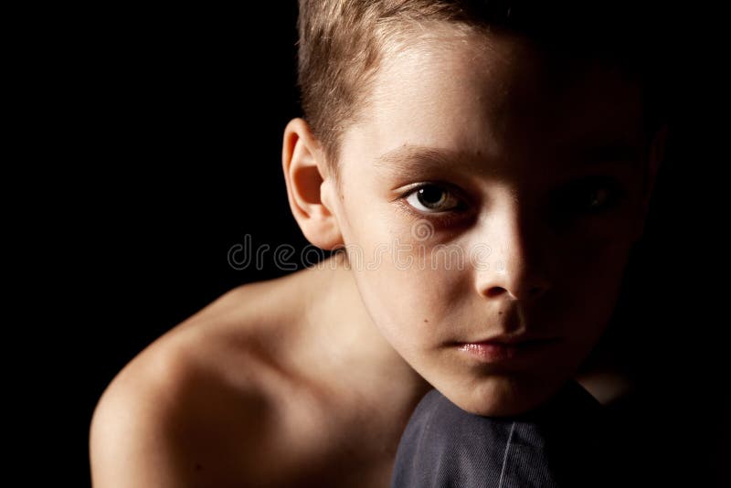 Weeping Boy Curled Up in Corner Stock Photo - Image of captive ...