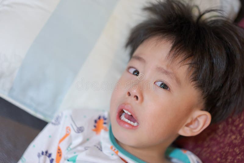A Sad Boy is Crying, he Doesn`t Want To Go To Bed at Night. Stock Image ...