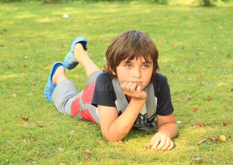 Sad boy stock photo. Image of lying, seriouse, think - 44271794