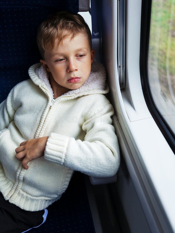 Sad Boy Looking Out Window Stock Images - Download 181 Royalty Free Photos