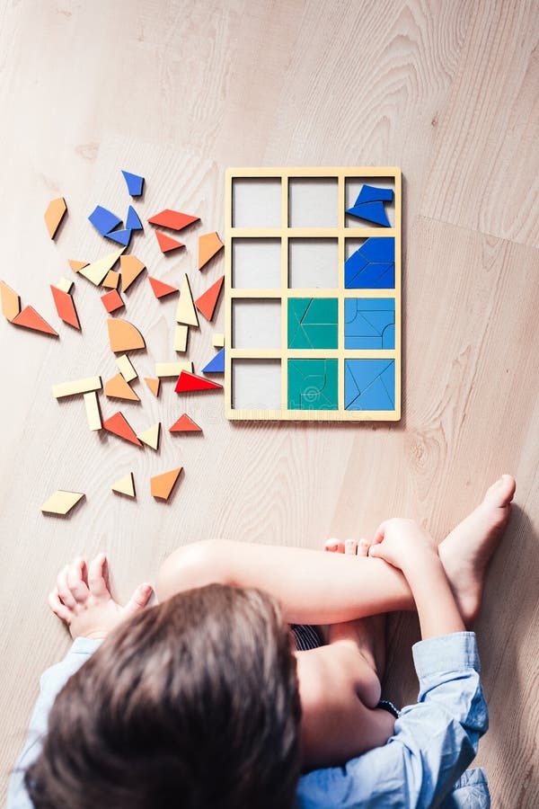 Sad Boy Sitting with Unsolved Puzzle Stock Photo - Image of caucasian ...