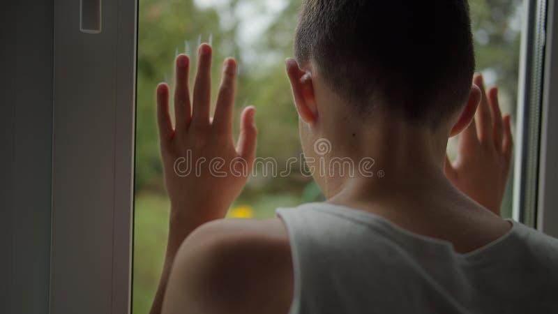 Sad Alone Boy Sitting at the Window Looking at One Point, Difficult ...