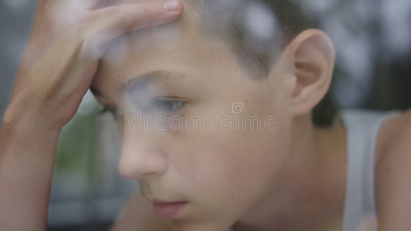 Portrait of a Sad Boy Near the Window, Thinking about Something Stock ...