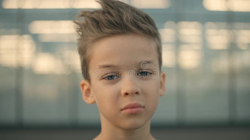 Sad Boy is Thinking and Looking at the Camera. Face of a Little Serious ...