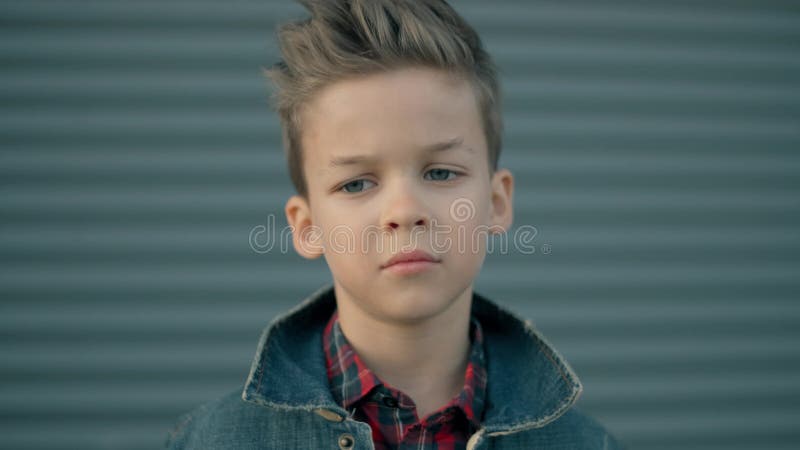 Sad Boy is Thinking and Looking at the Camera. Face of a Little Serious ...