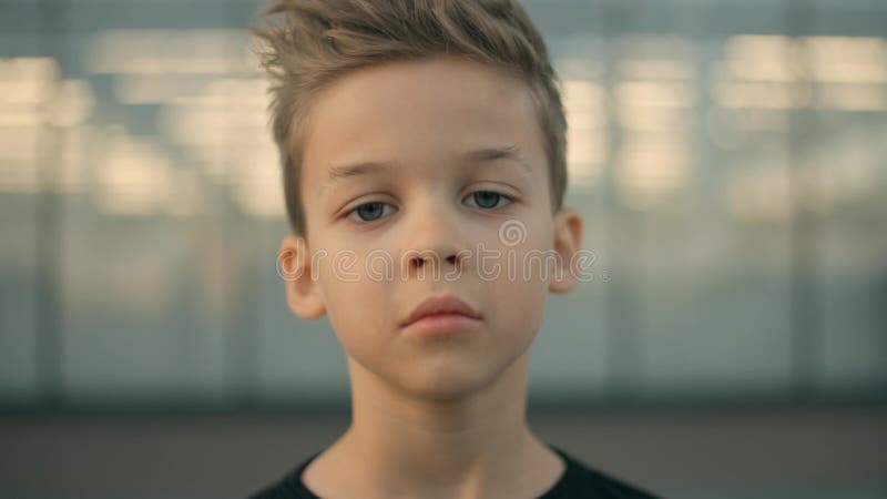 Sad Boy is Thinking and Looking at the Camera. Face of a Little Serious ...