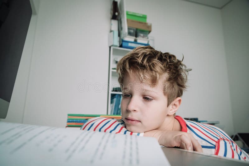 Sad Boy Tired and Stressed of Reading, Doing Homework Stock Photo ...