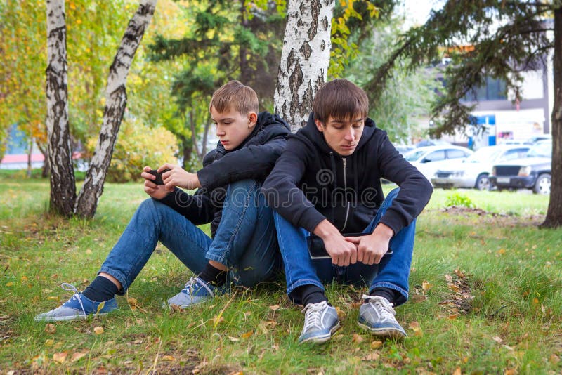 Sad Boys outdoor stock image. Image of caucasian, annoyed - 66033789
