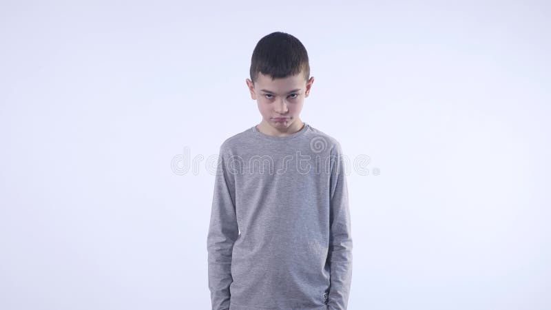 Sad Brunette Kid Over Isolated White Background Stock Video - Video of ...