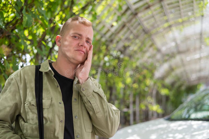 Sad Caucasian Man with Hearing Aids Outdoors. Stock Image - Image of ...