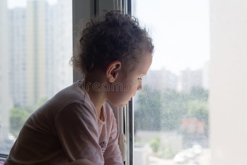 A Sad Child Looks Out the Window Stock Image - Image of safe, bored ...