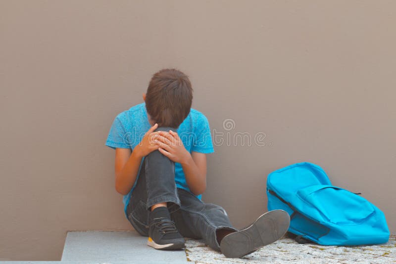 Sad Child Sitting Alone Near School on the Ground Outdoors Stock Image ...