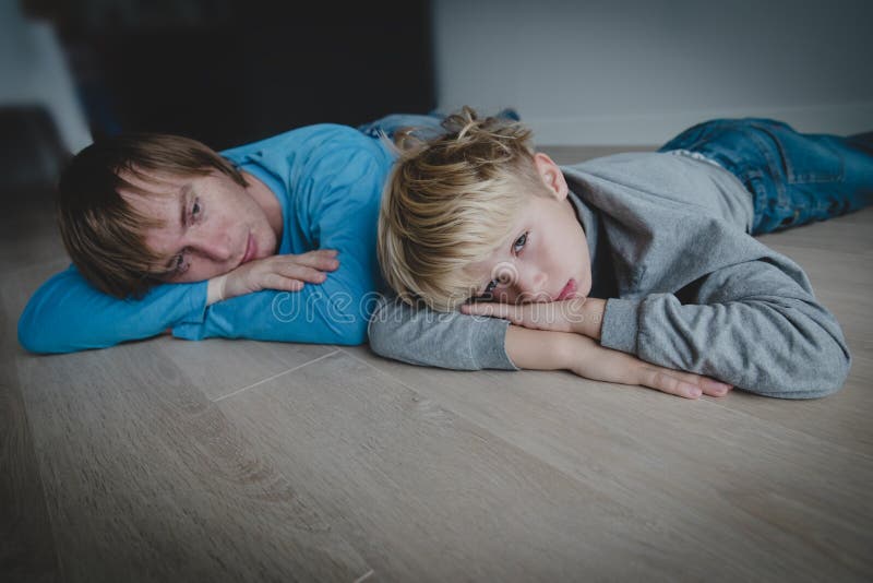 Sad Child with Stressed Father, Family Problems, Sorrow Stock Photo ...