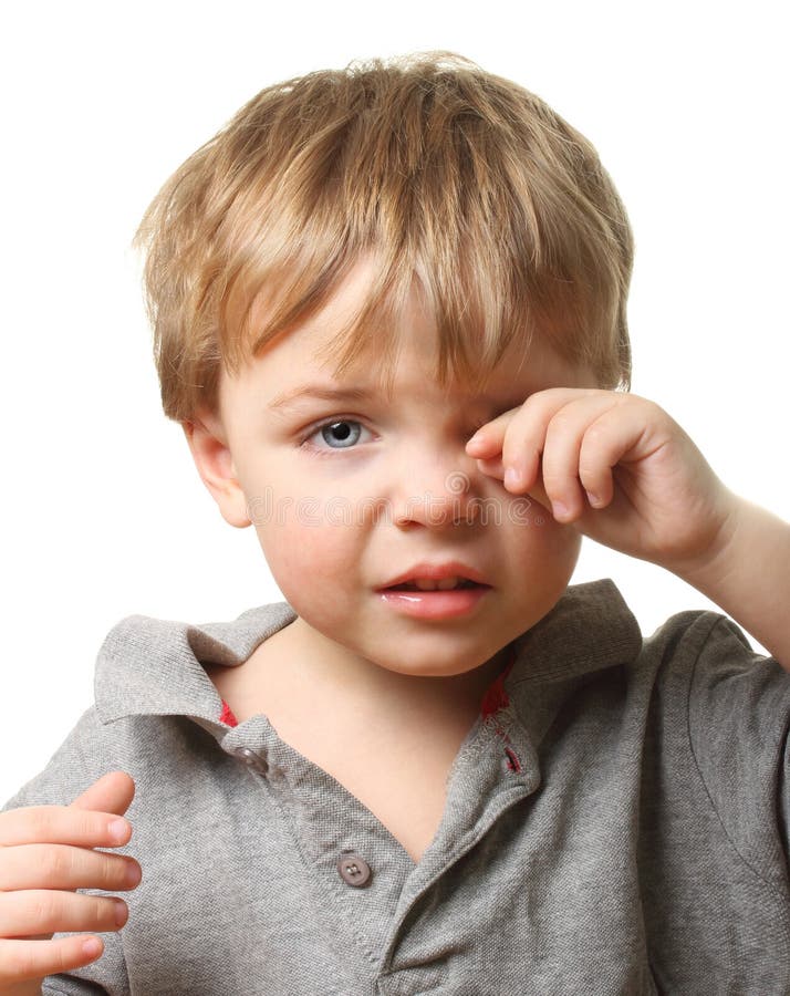 Sad child wiping tears stock photo. Image of childhood - 51198414