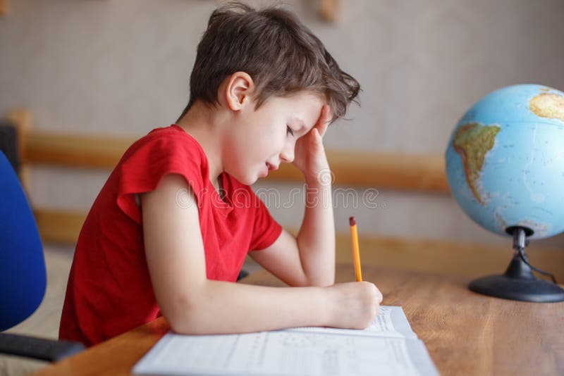 Sad Child Working on Hard Homework at Home Stock Image - Image of ...