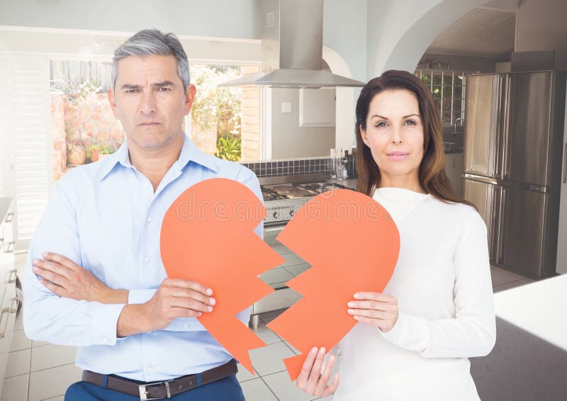 Sad Couple Holding Broken Hearts at Home Stock Photo - Image of divorce ...
