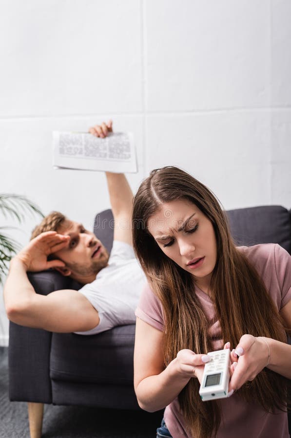 Sad Couple with Remote Controller and Stock Image - Image of ...