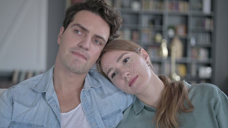 The Sad Couple Resting on Head on Shoulder and Thinking Stock Photo ...