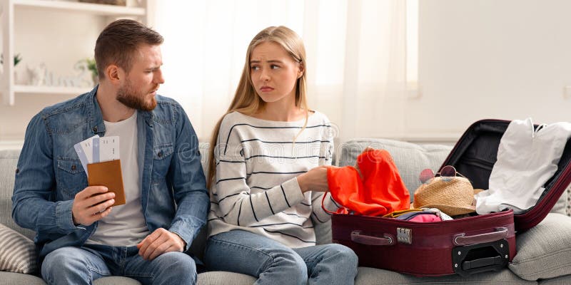 Sad Couple Suffering Unpacking Suitcase for Trip at Home Stock Photo ...